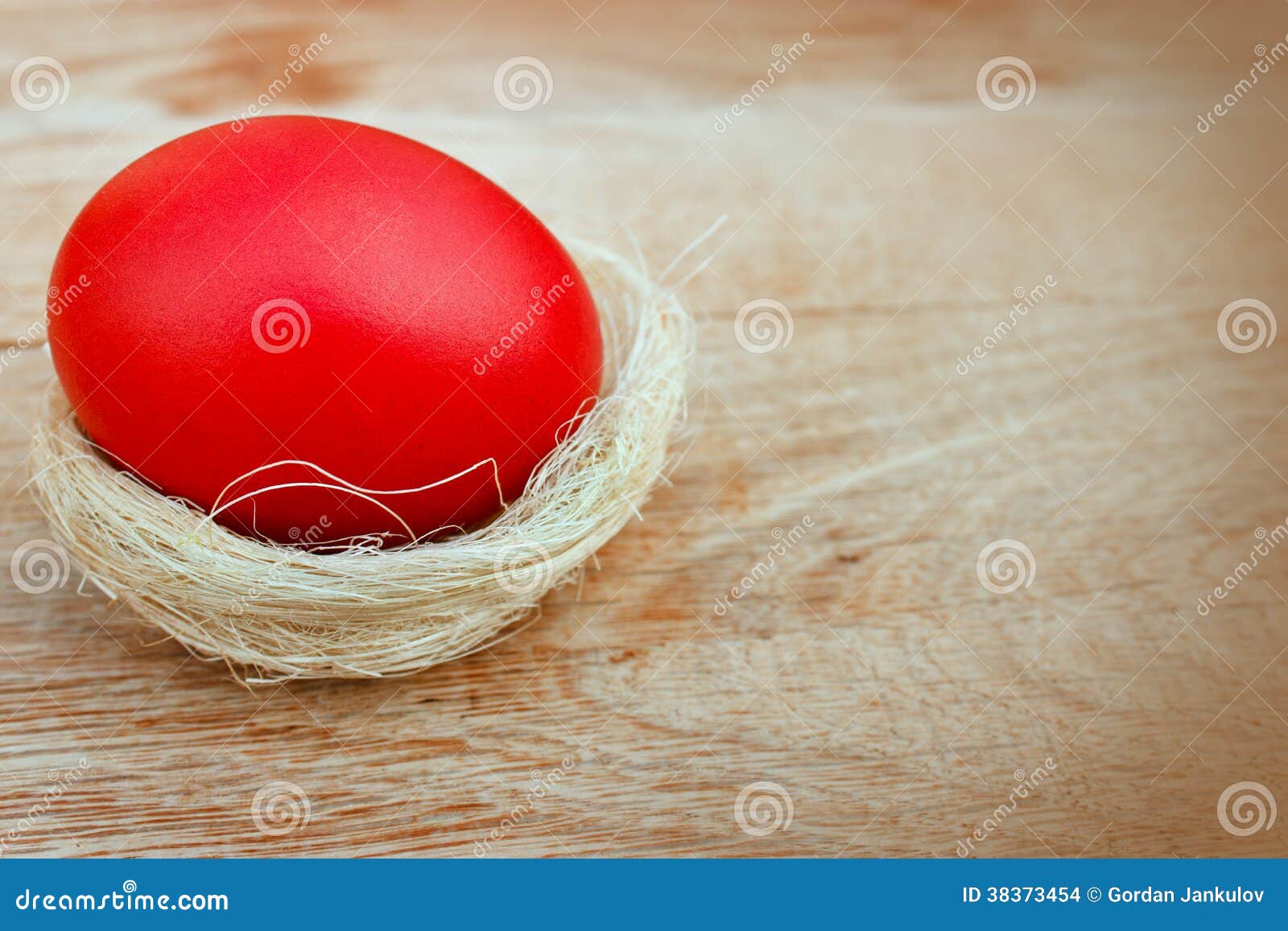 Red Easter egg in nest stock photo. Image of large, colorful - 38373454