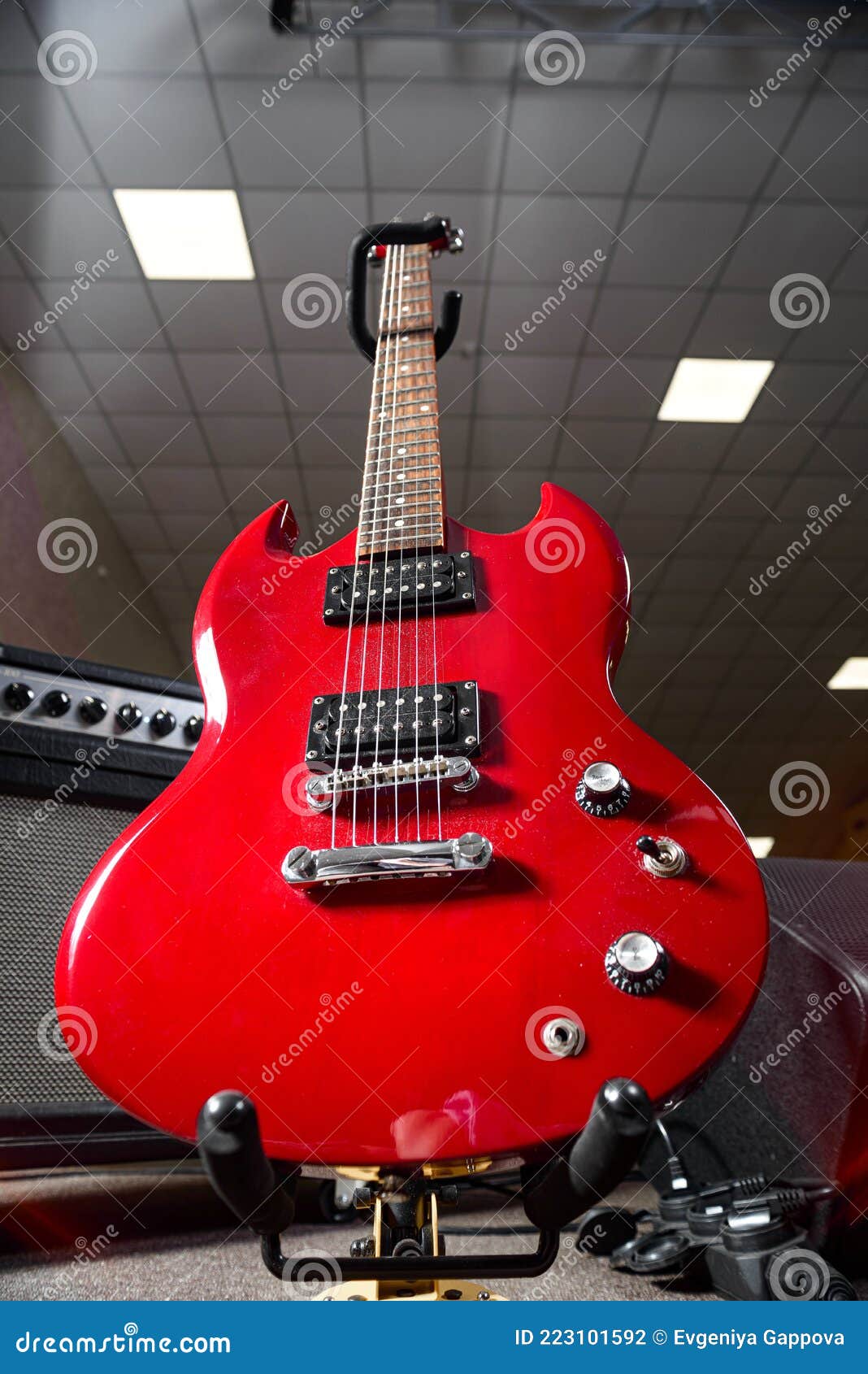 Red Electric Guitar and Amplifier are on the Stage Stock Photo - Image ...