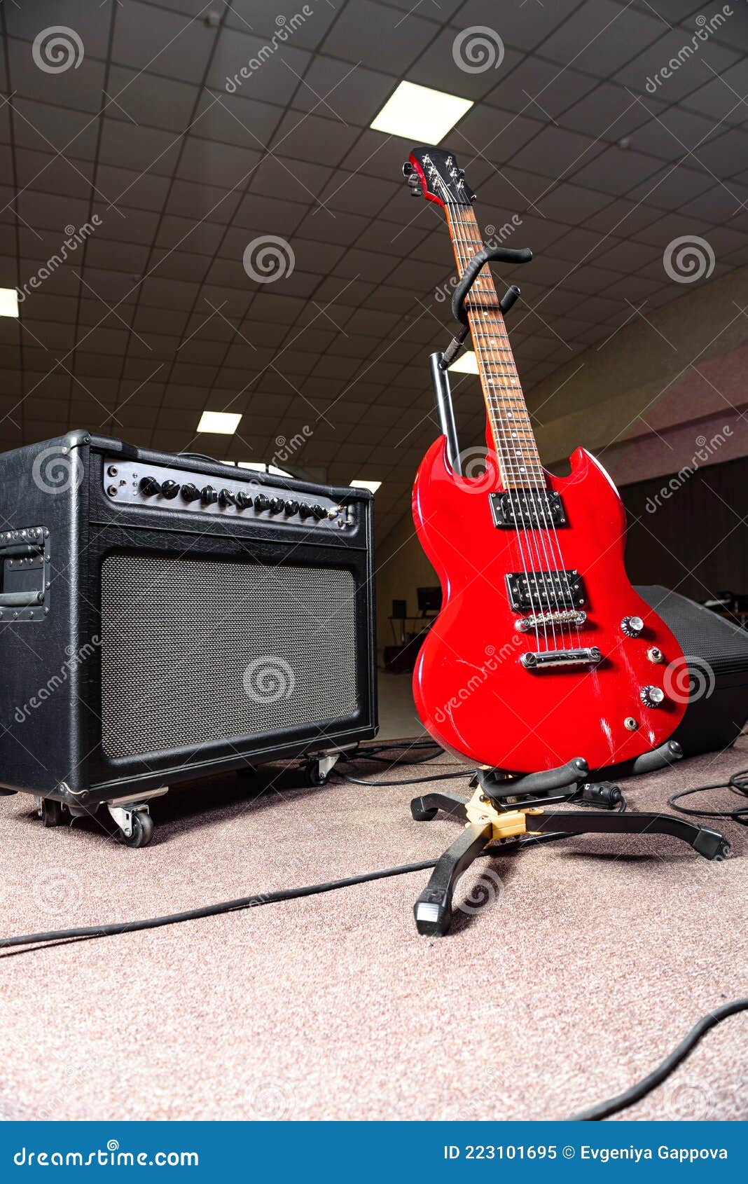 Red Electric Guitar and Amplifier are on the Stage Stock Image - Image ...
