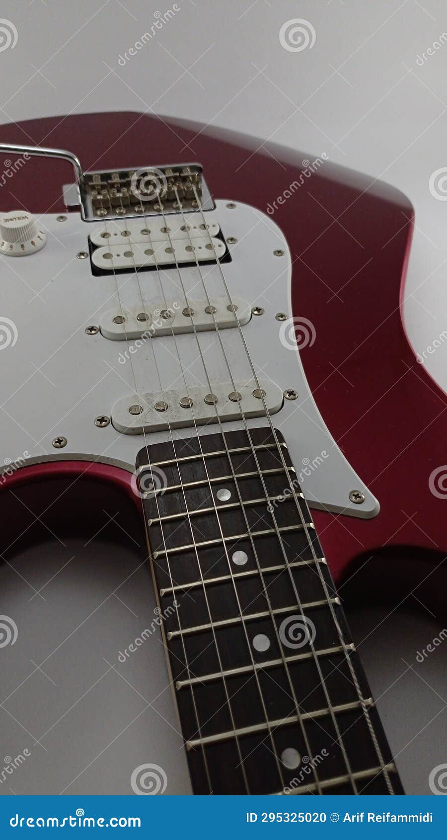 The Red Electric Guitar Shows the Strings and Body Stock Photo - Image ...