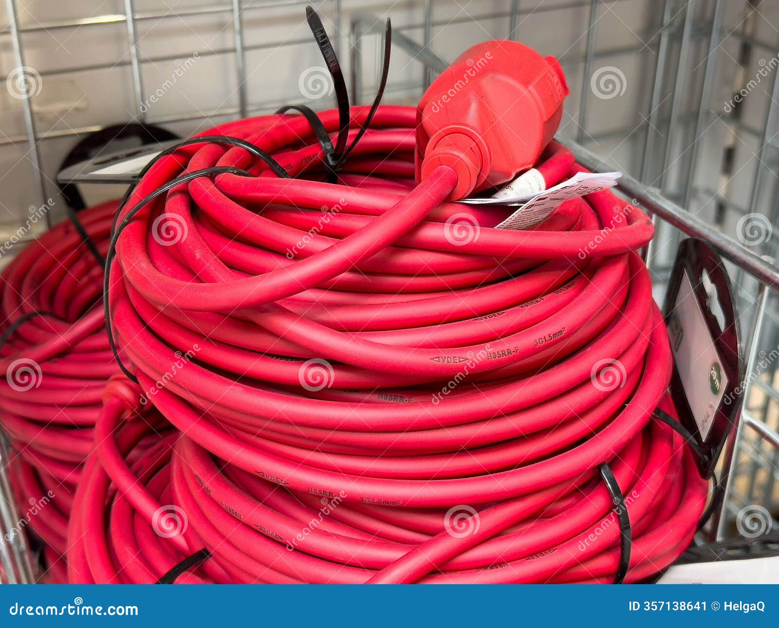 Red Electrical Extension Cord Coiled on Metal Shelf in Hardware Store ...