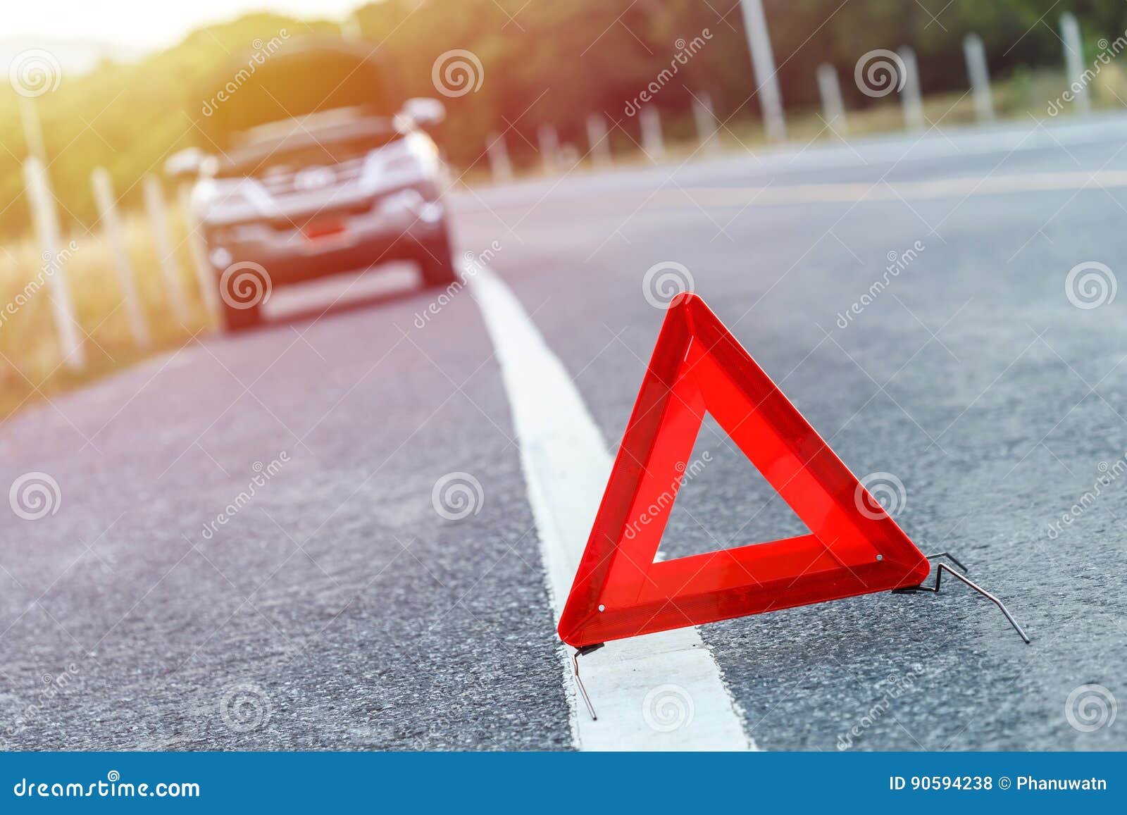 Red Emergency Stop Sign and Broken Silver Car on the Road Stock Photo ...
