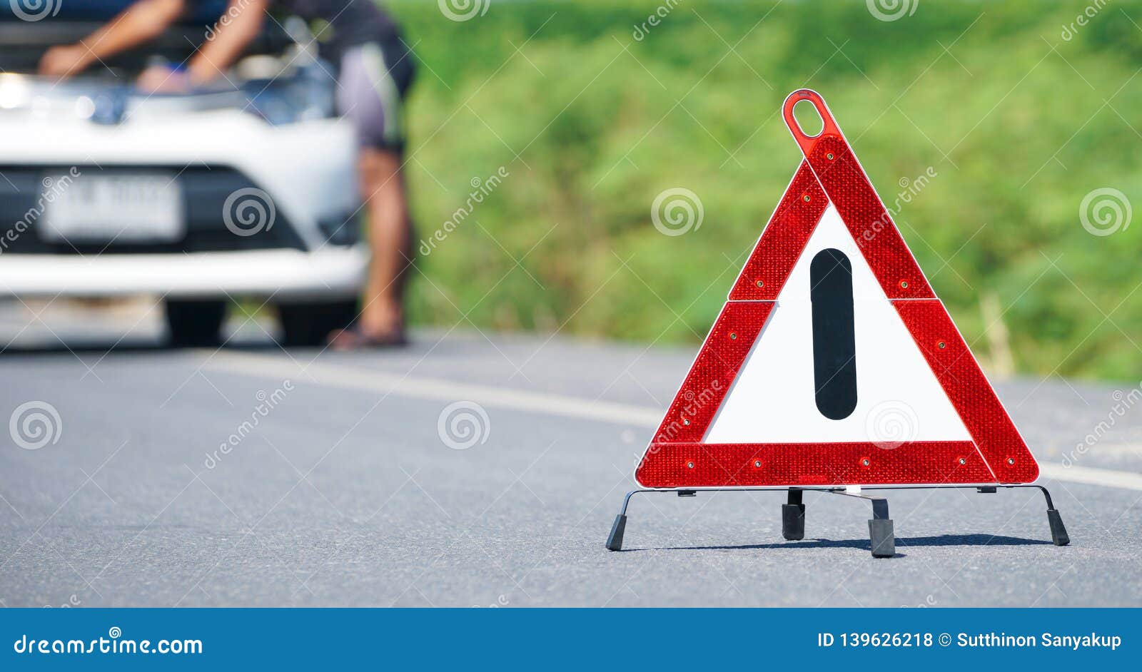 Red Emergency Stop Sign and White Car after Accident on the Road Stock ...