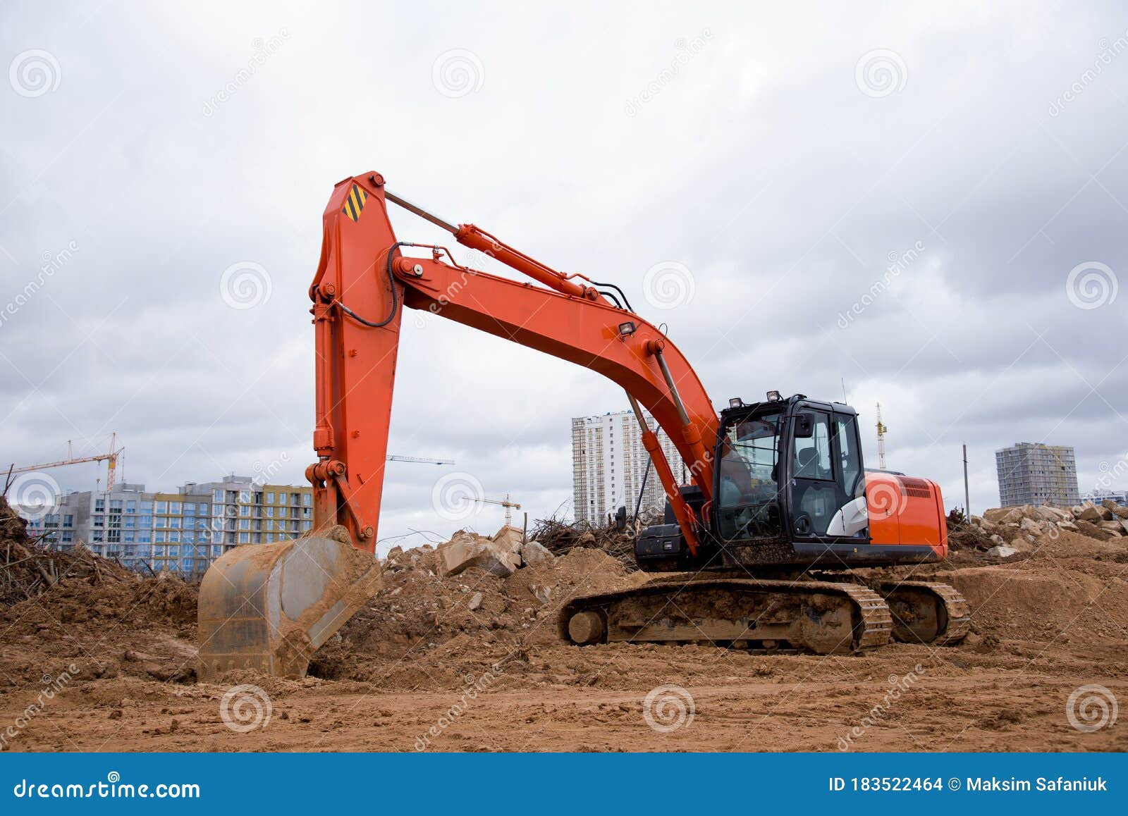 Red Excavator during Earthmoving at Construction Site. Backhoe Dig ...