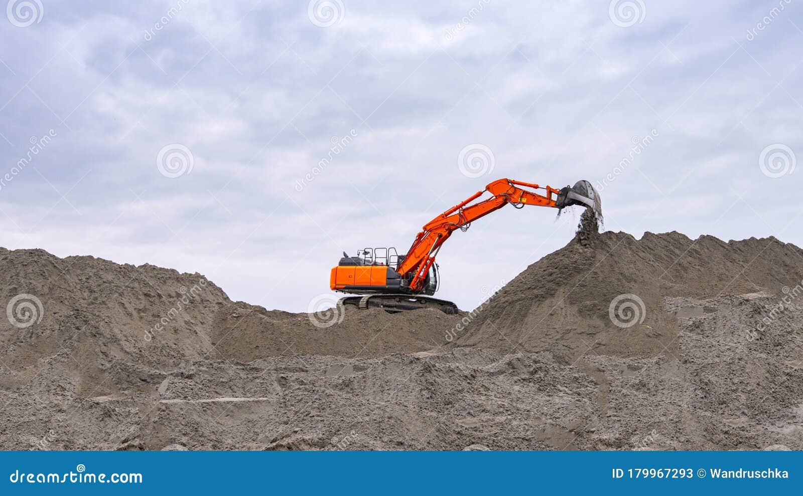 A Red Excavator on a Large Pile of Sand Stock Image - Image of ...