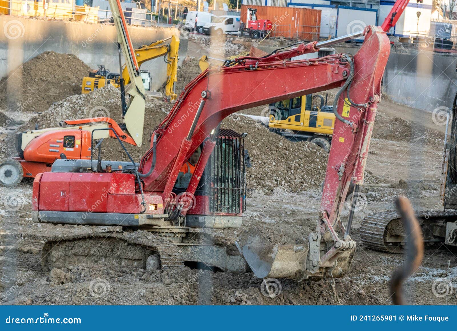 Red Excavator Working on Construction Site Stock Image - Image of ...