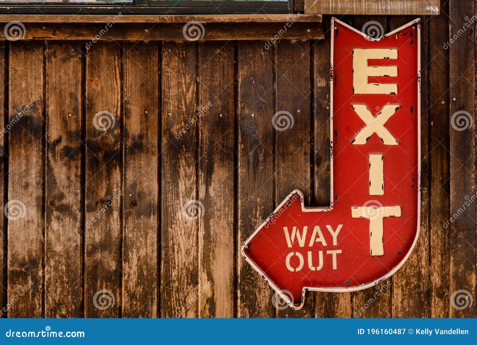Red Exit Arrow on Wooden Wall Stock Image - Image of wall, hanging ...