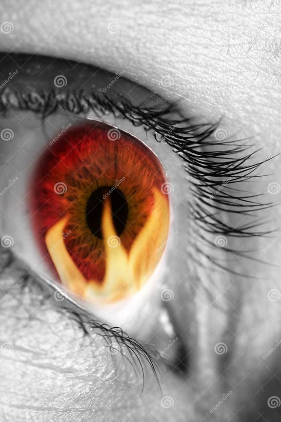 Red eye refecting fire stock image. Image of eyelid, iris - 5403101