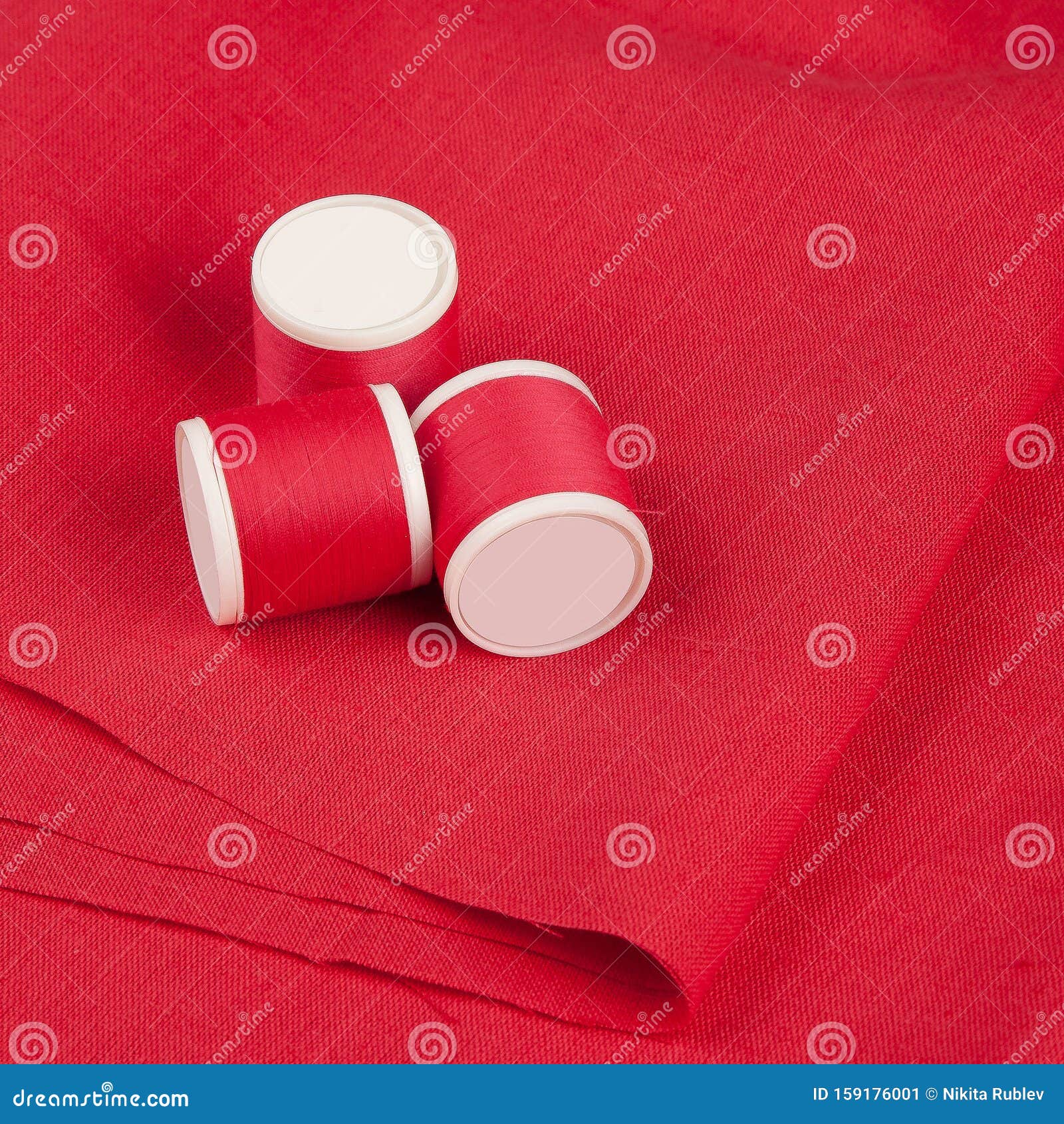 Red Fabric with Spool of Sewing Thread Stock Image - Image of macro ...