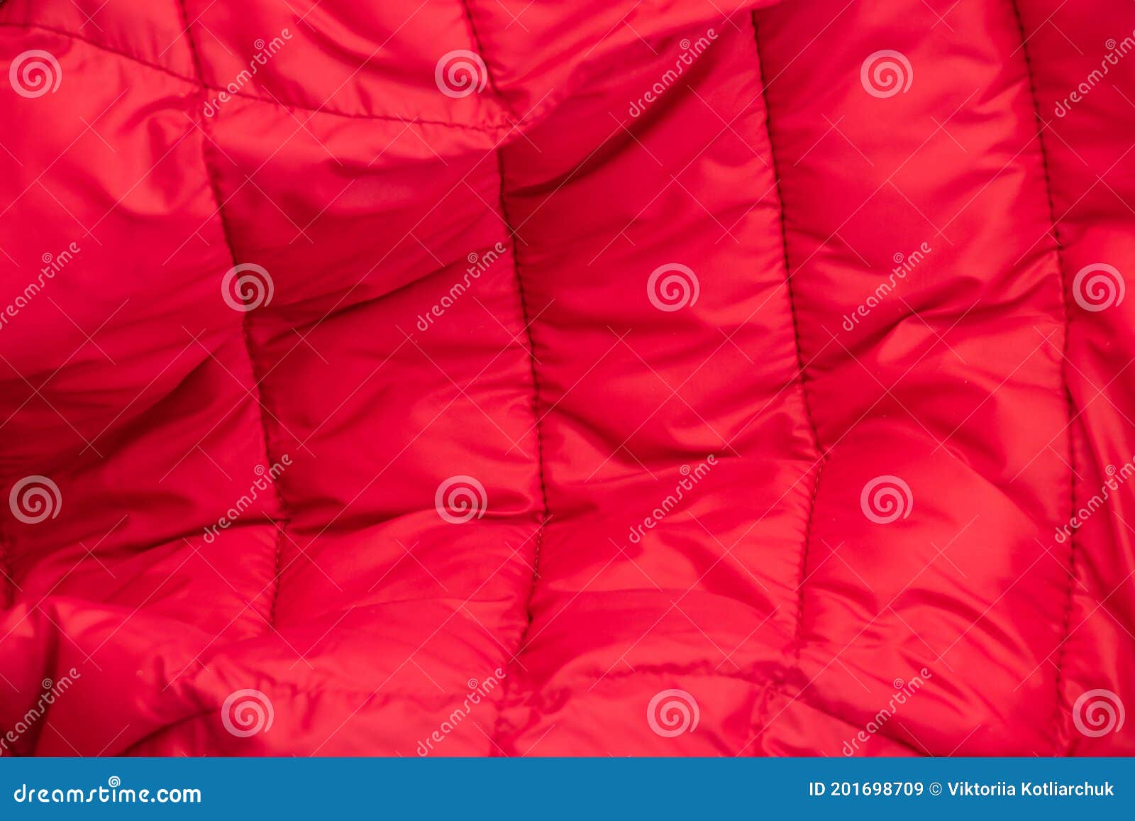 Red Fabric of a Warm Puffed Jacket As a Background Close-up Stock Image ...