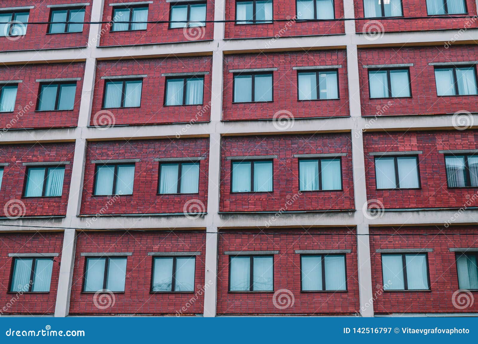Red facade of the house stock image. Image of wall, windows - 142516797