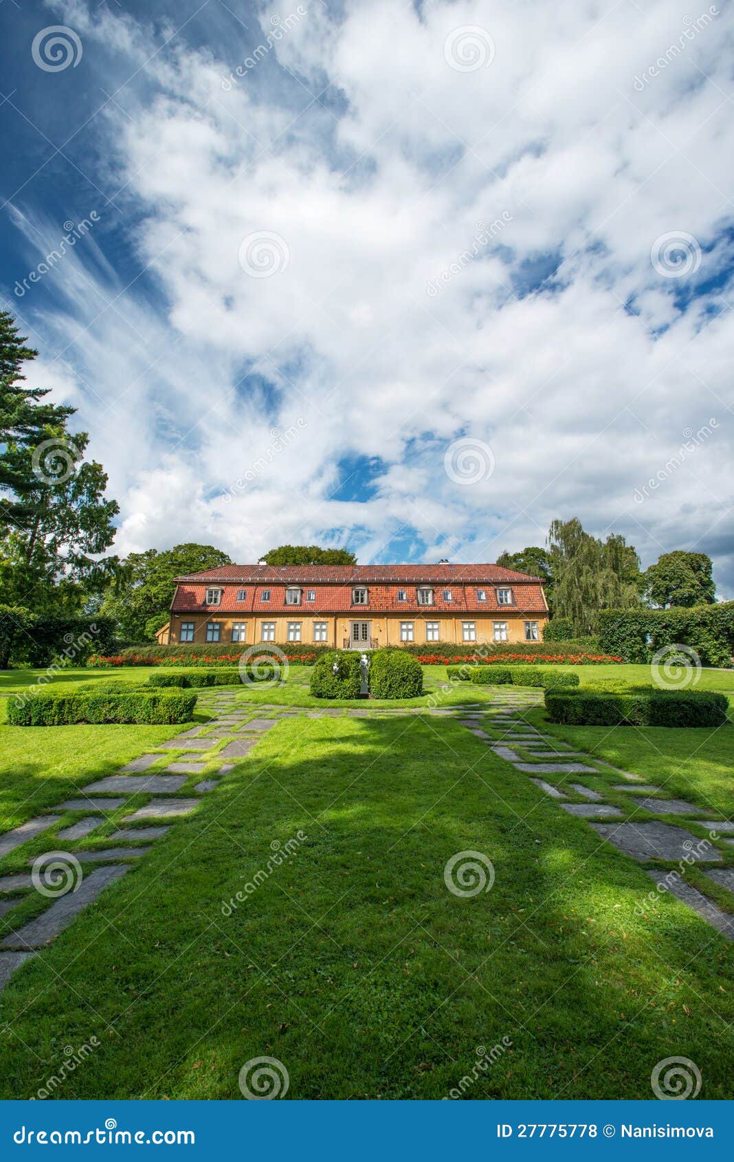 Red farm house in a garden stock photo. Image of locations - 27775778