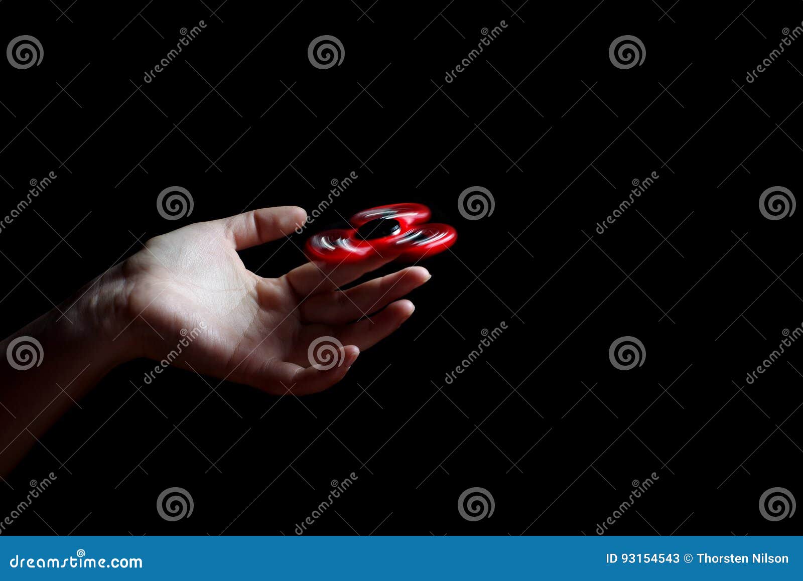 Red Fidget Spinner in Action Editorial Stock Photo - Image of fidget ...