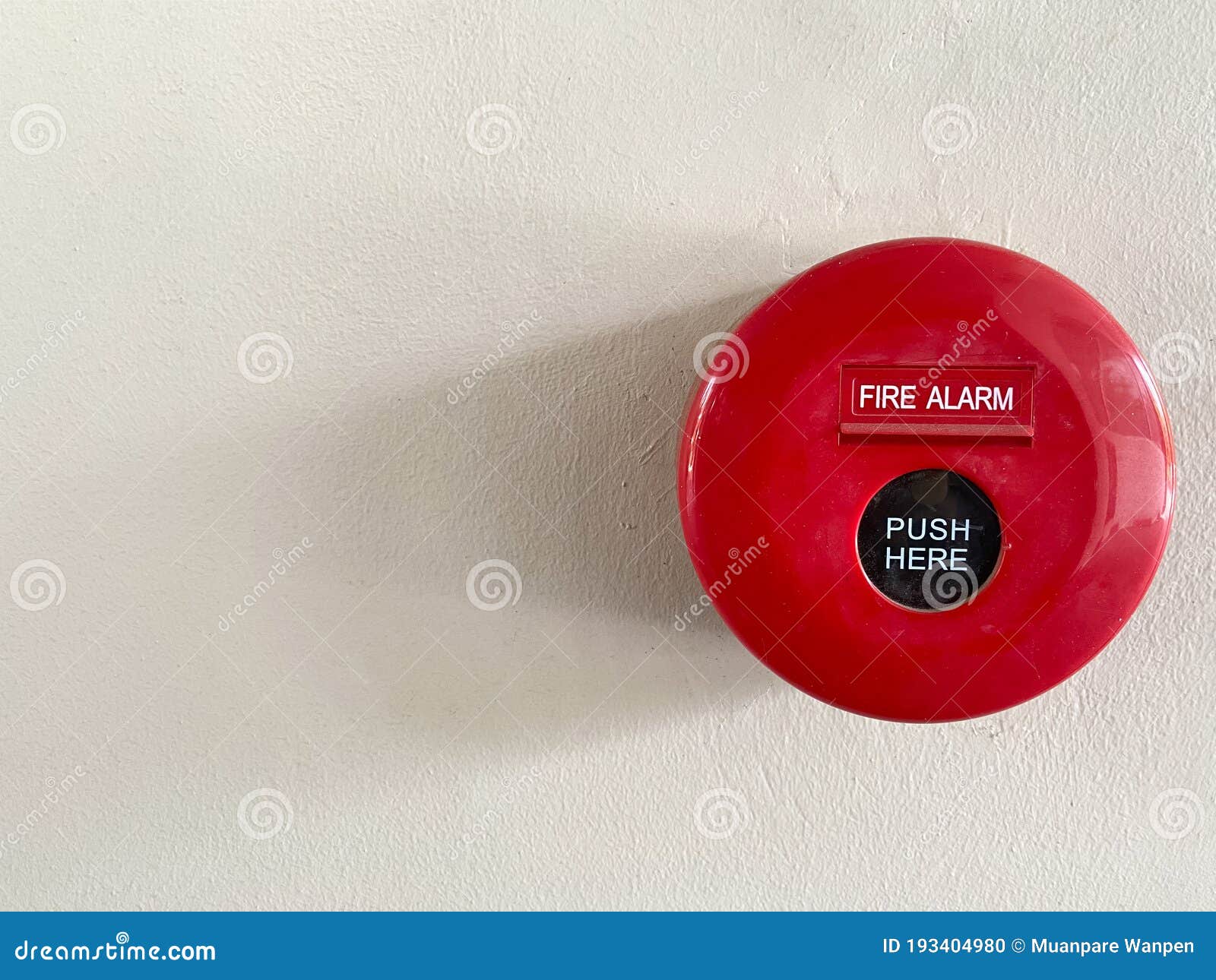 Red Fire Alarm Switch on the White Concrete Wall in the Building. Stock ...