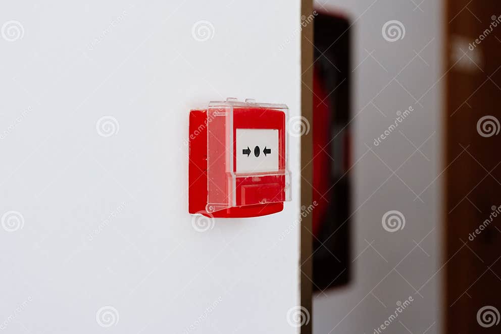 Red fire emergency button stock photo. Image of wall - 148144432