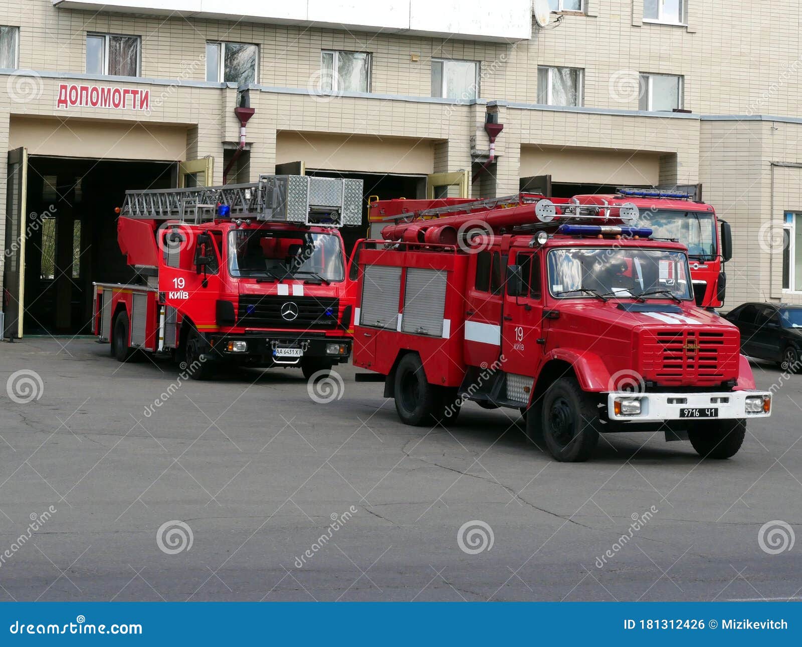 Red Fire Engines Standing at the Fire Station during the Day. Editorial ...