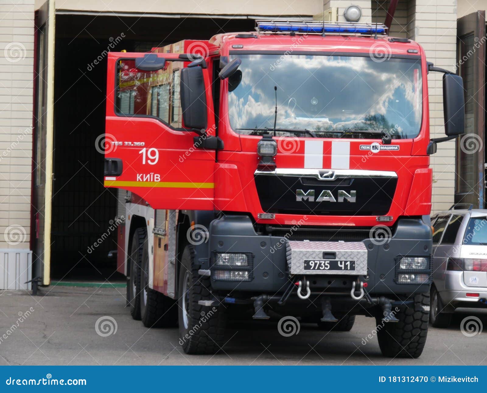 Red Fire Engines Standing at the Fire Station during the Day. Editorial ...