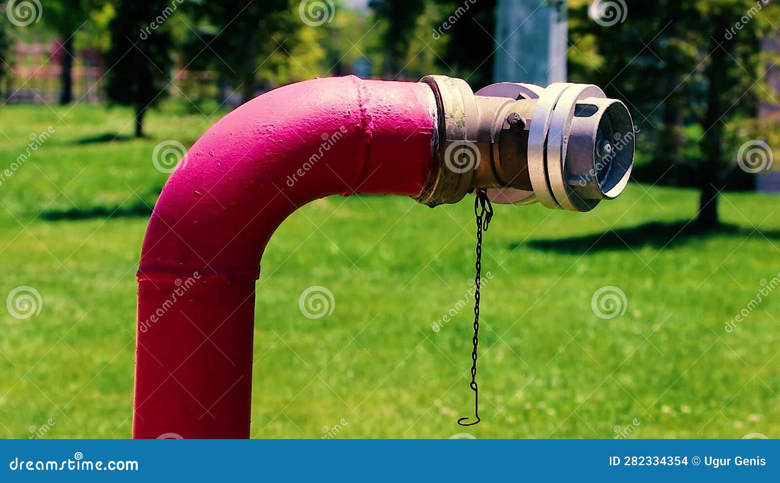 Red Fire Hydrant with a Hose Reel in a Green Park Stock Footage - Video ...