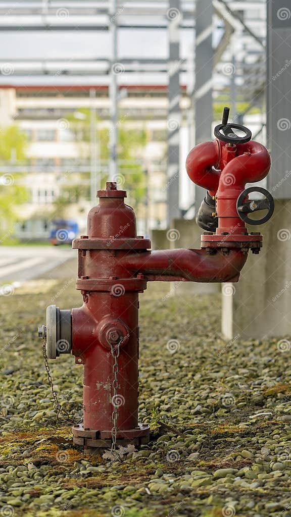 A Red Fire Hydrant at an Industrial Plant. Stock Photo - Image of ...