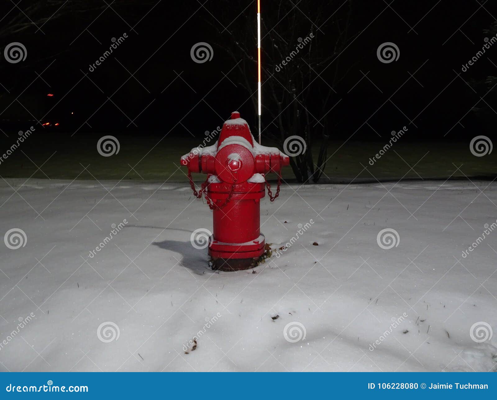 Red fire hydrant and snow stock photo. Image of flag - 106228080