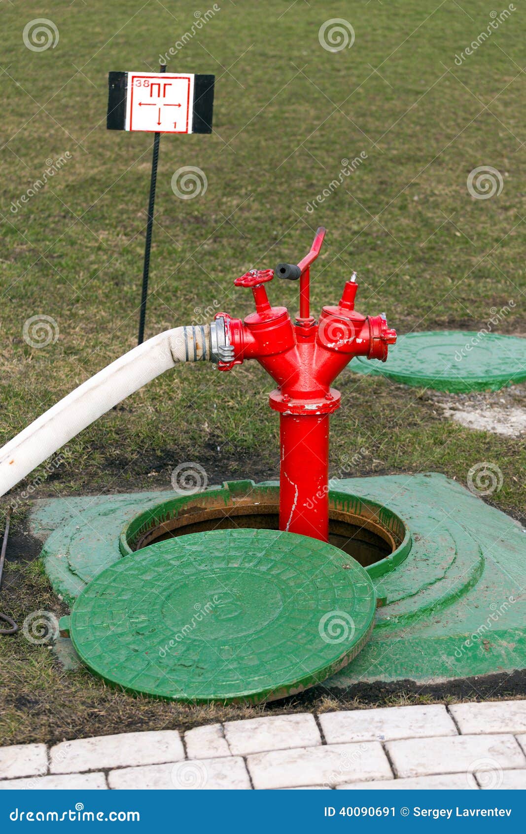 Red Fire Hydrant Stands in Manhole Stock Image - Image of rescue ...