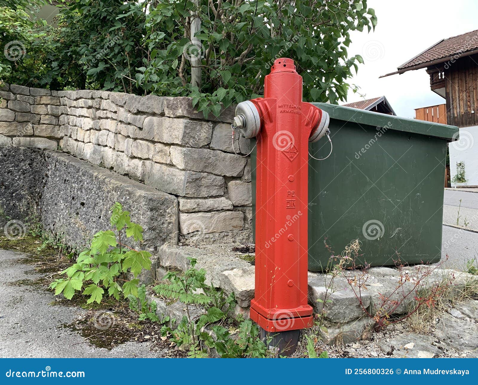 Red Fire Hydrant on the Streets of the German City of Miesbach ...