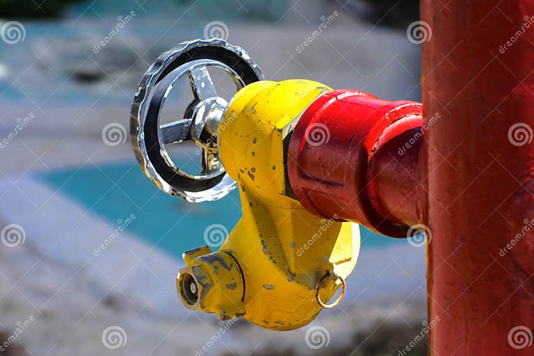 Red Fire Hydrant with Yellow Connectors. Fire Hydrant or Fire Pump ...