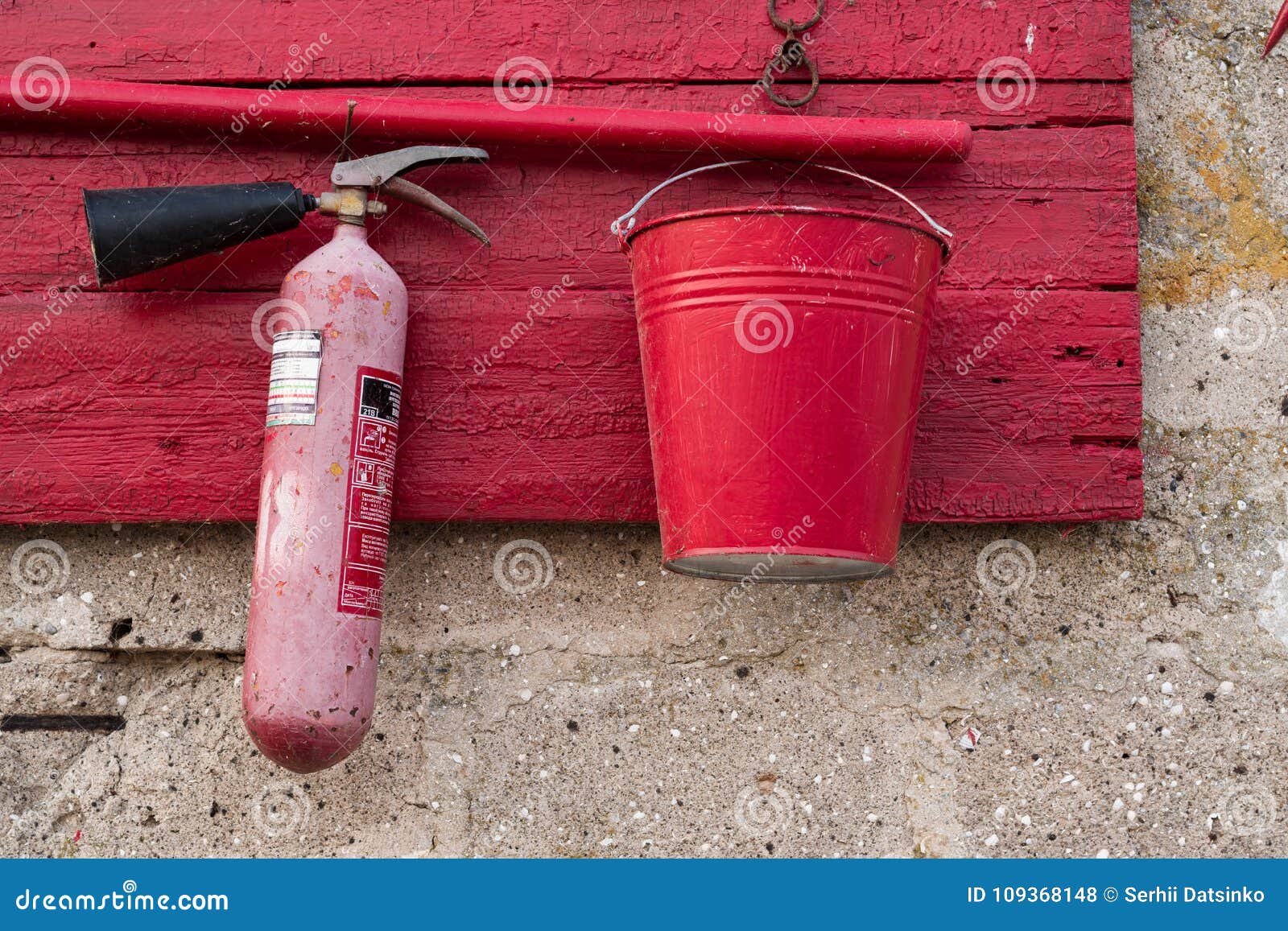 Red Fire Shield on a Stone Wall Stock Photo - Image of equipment ...