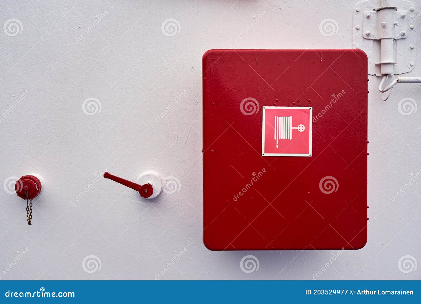 A Red Fire Shield on a White Wall on a Ship Stock Image - Image of ...