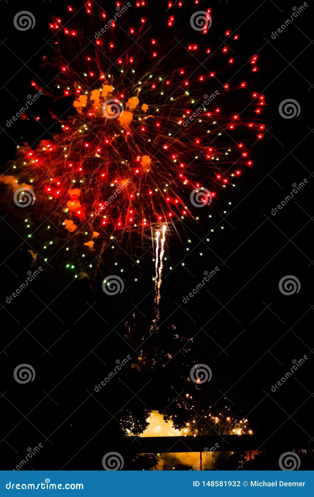 Red Firework Exploding Above the Grand River on the 4th of July Stock ...