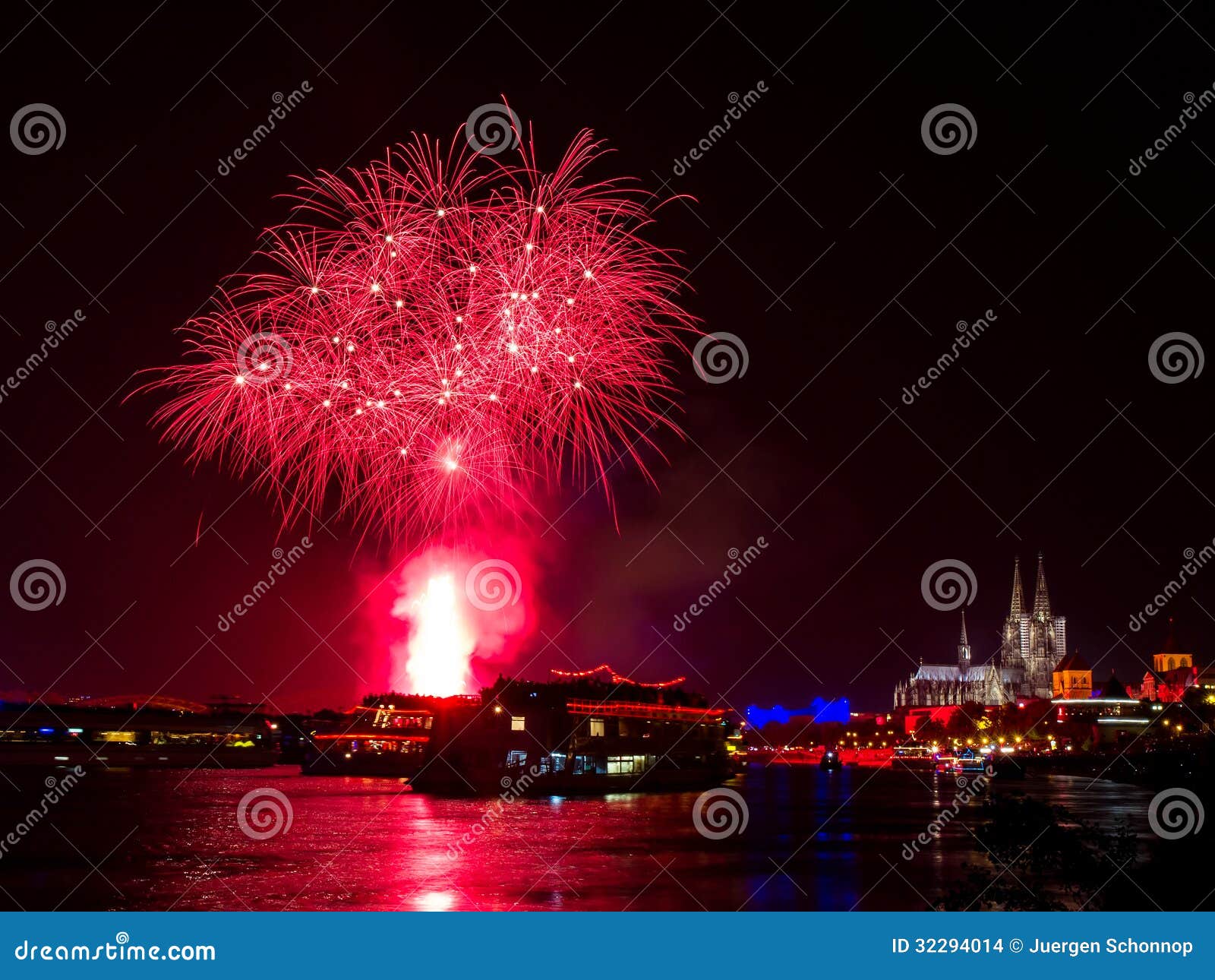 Red fireworks over Cologne stock photo. Image of color - 32294014