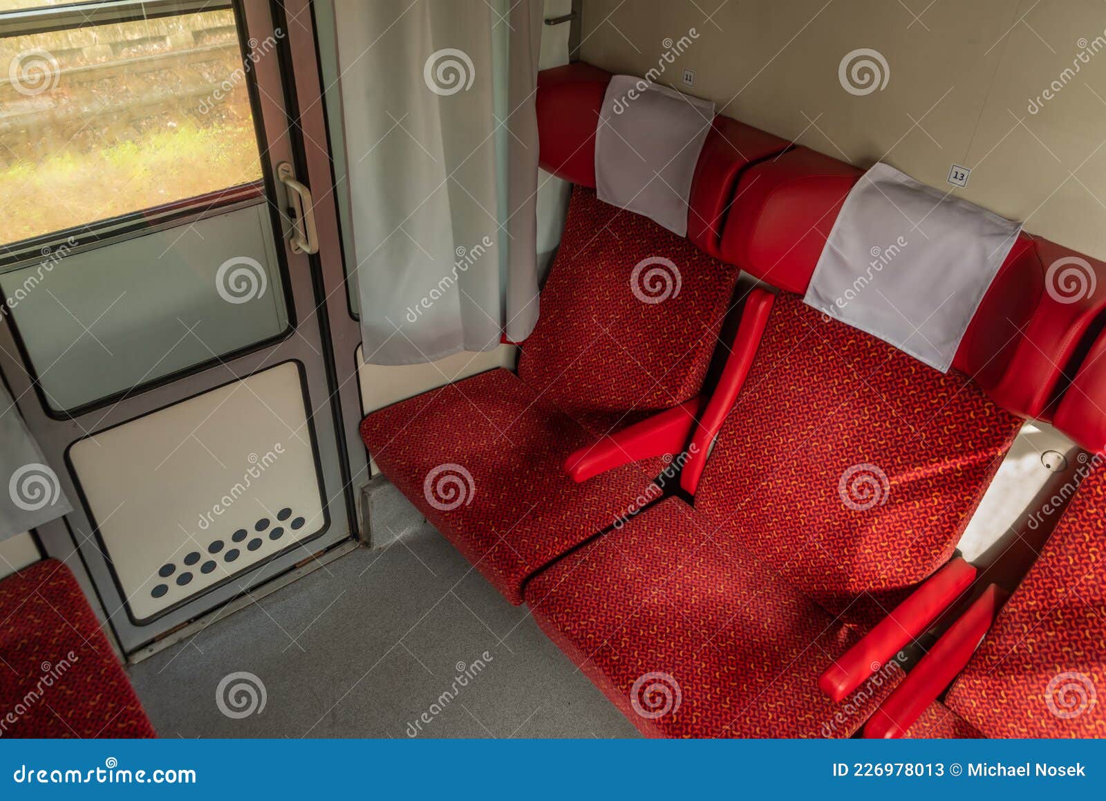 Red First Class Compartment in Train with Sunny Shine in Evening Stock ...