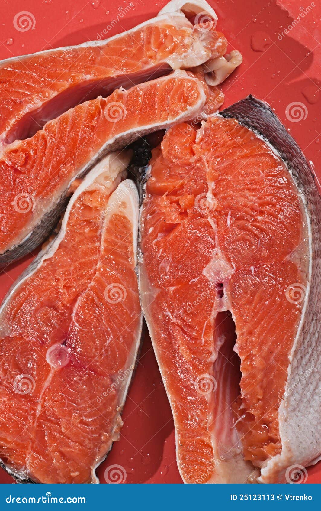 Red fish on a red dish stock image. Image of portion - 25123113
