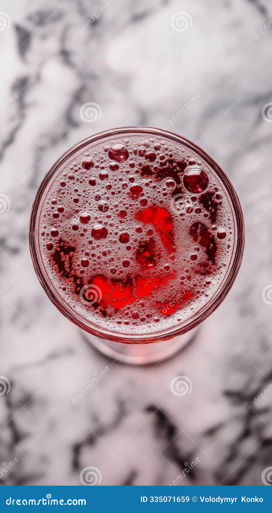 Red Fizzy Drink in Glass on Marble Surface, Top View. Refreshing ...