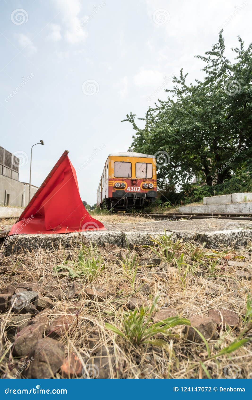Red flag along the railway stock photo. Image of uniform - 124147072