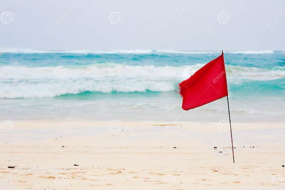 Red flag on beach stock image. Image of caribbean, wave - 12419761