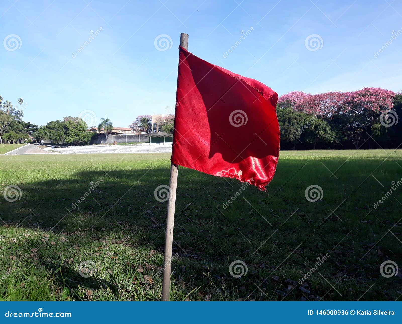 Red flag fluttering stock photo. Image of field, flag - 146000936