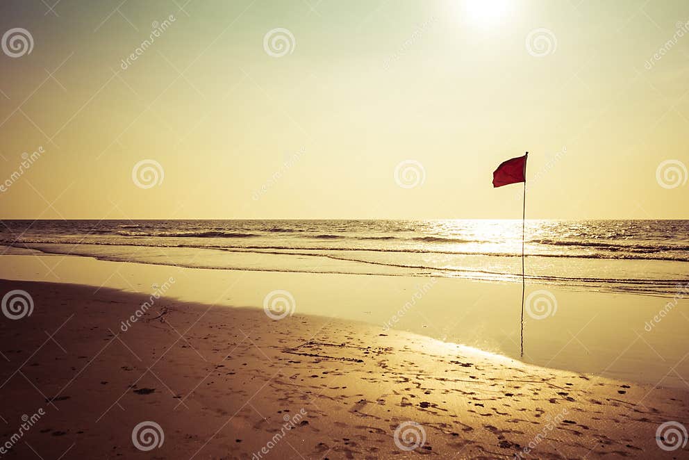Red Flag on the Ocean. Warning Red Flag Stock Image - Image of nature ...
