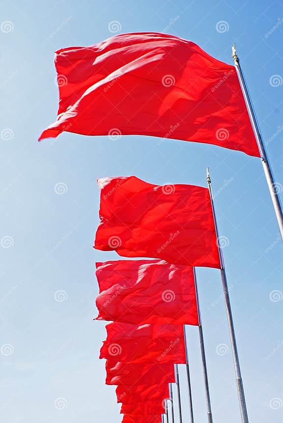 Red flags, yellow stars stock photo. Image of fabric, blue - 2347104