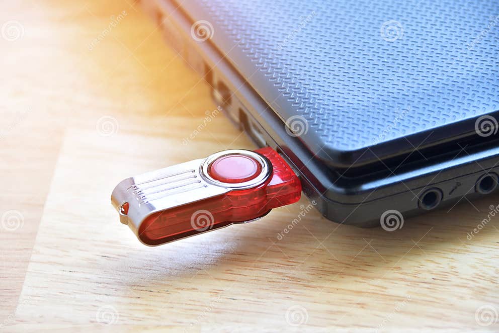 Red Flash Drive in Port Usb with Computer Notebook. Stock Image - Image ...