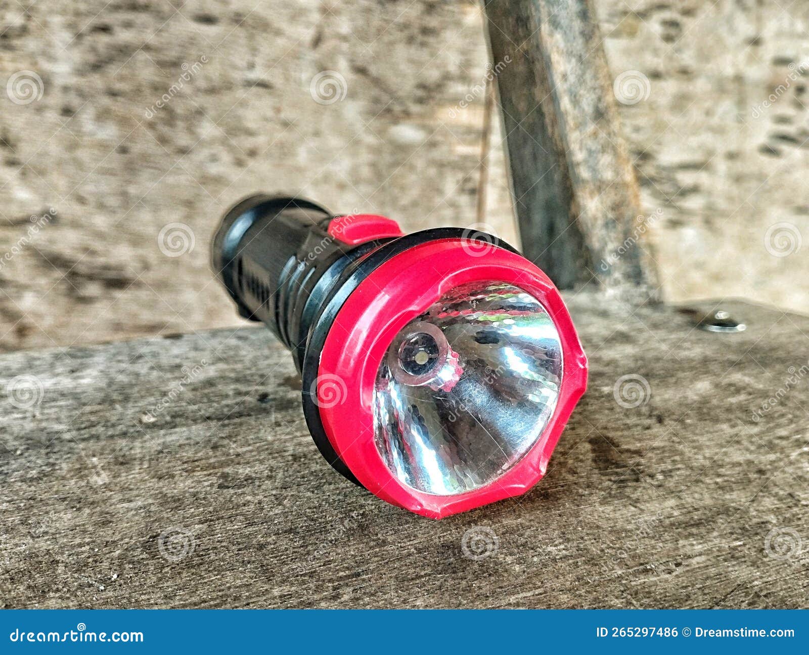 Red Flashlight with a Wooden Base Stock Photo - Image of base, black ...