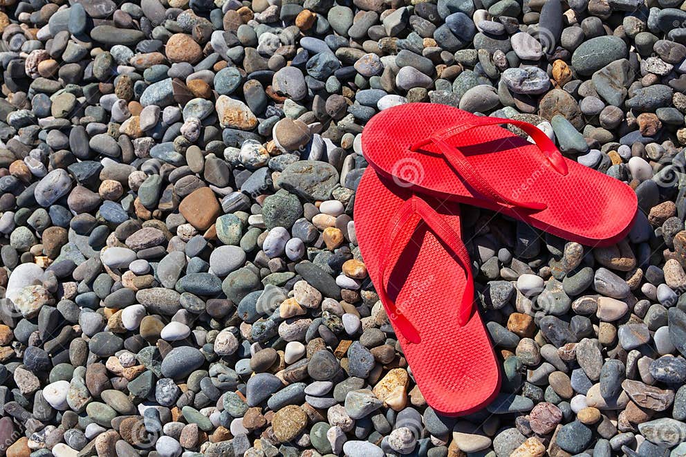 Red Flip Flops on a Pebble Beach Stock Photo - Image of relaxation ...