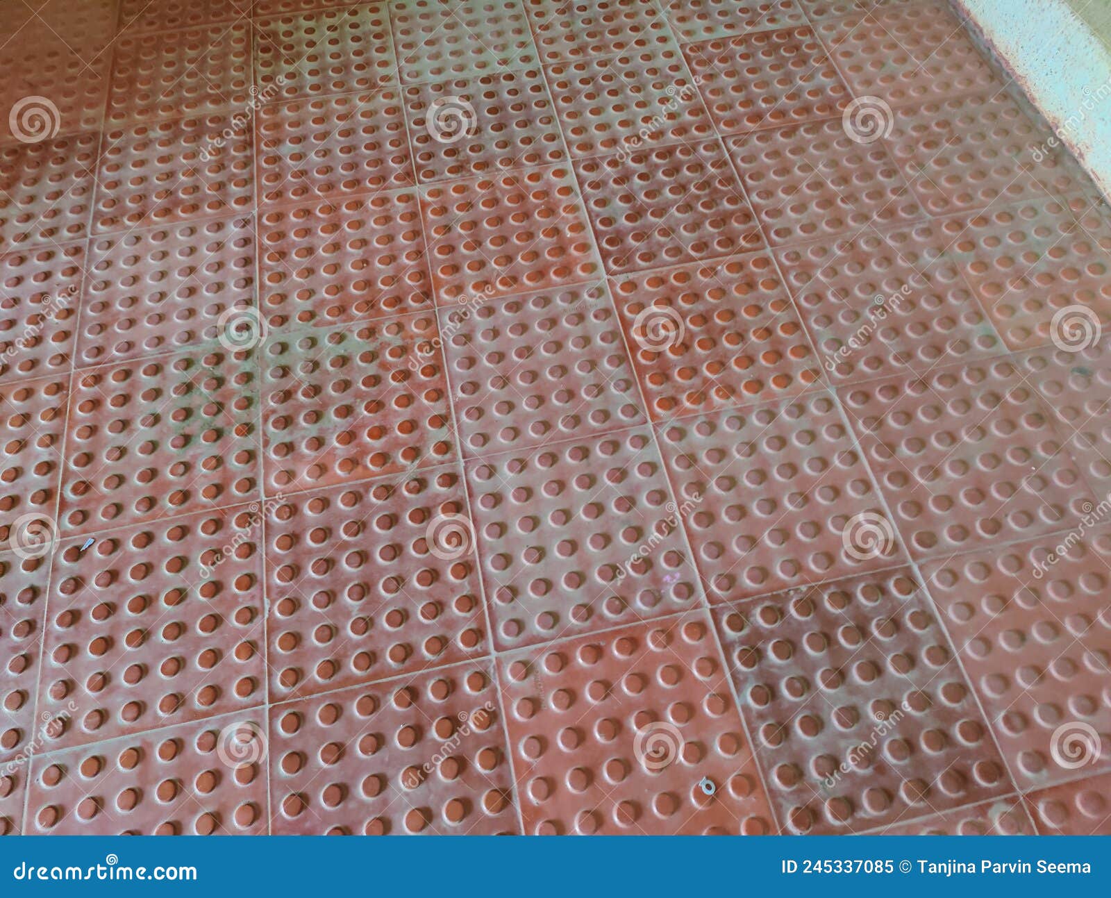Red floor tiles stock image. Image of circle, floor - 245337085