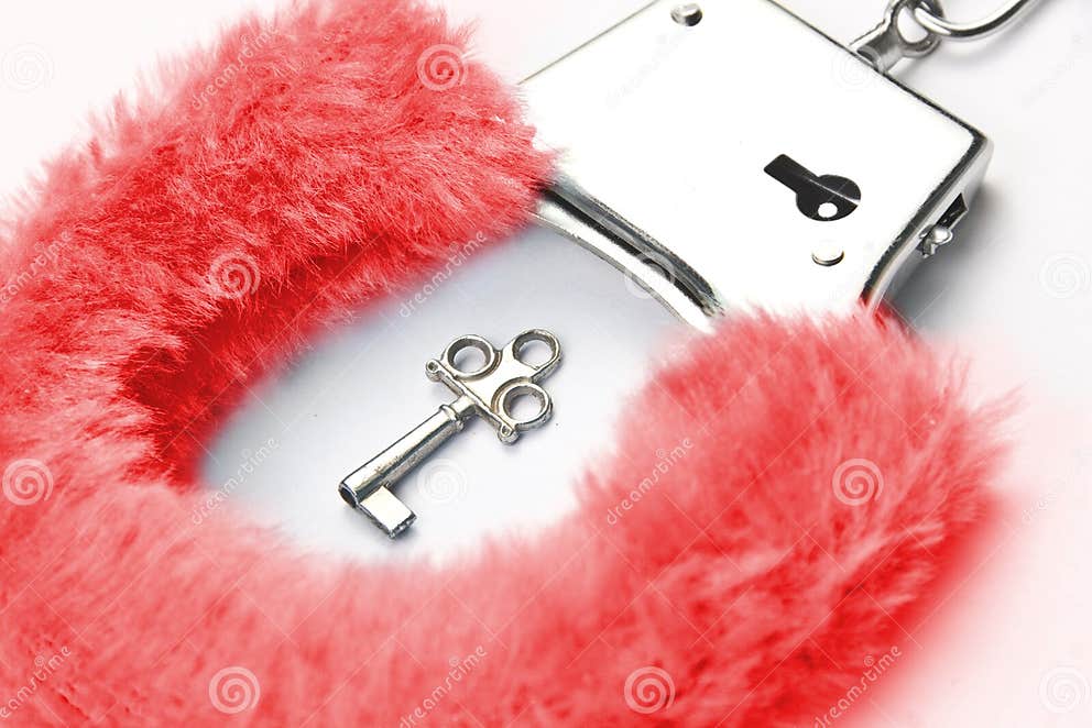 Red fluffy handcuffs stock image. Image of isolated, color - 13842021