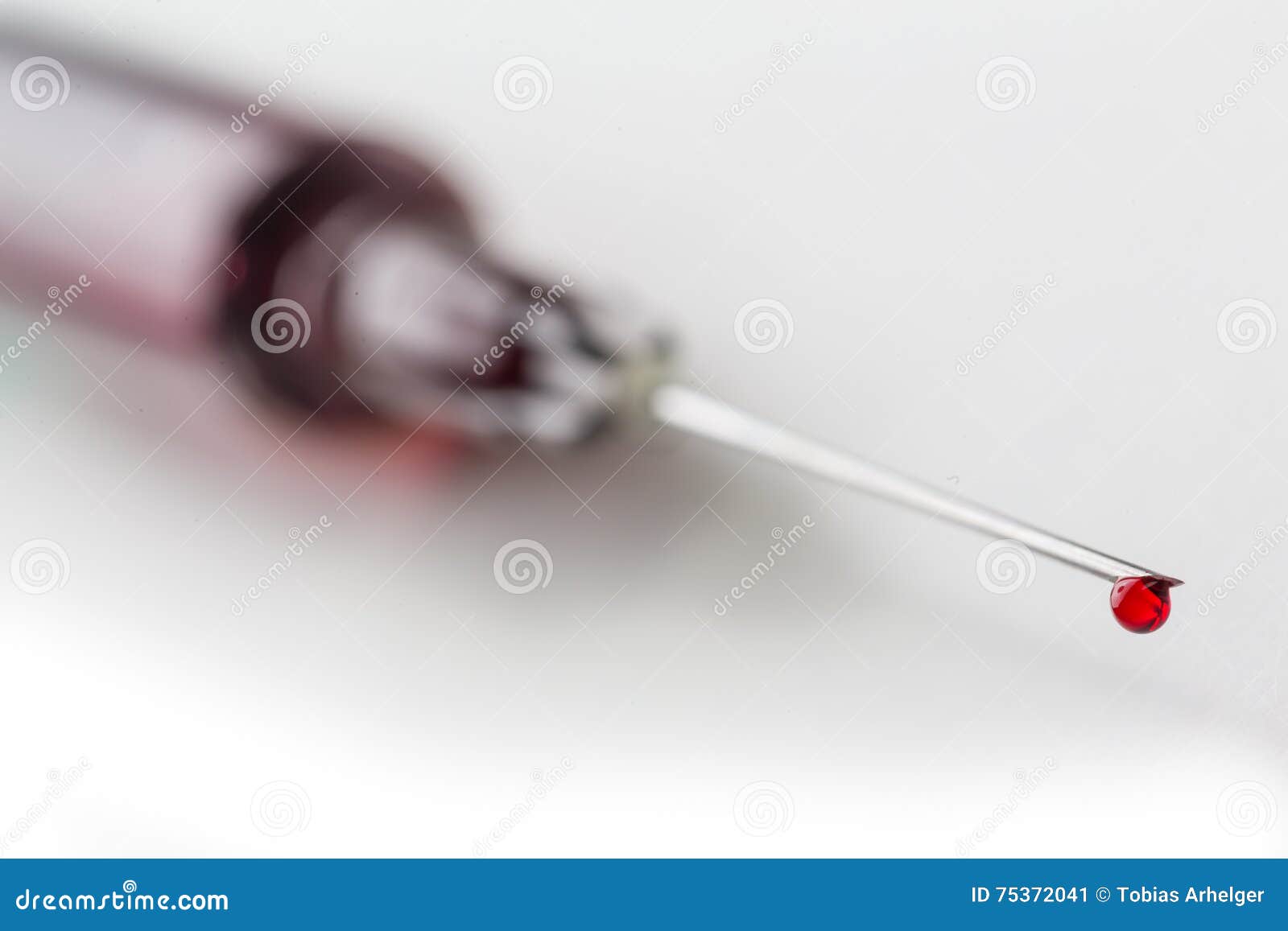 Red Fluid Coming Out of a Syrenge Injection Needle Stock Image - Image ...