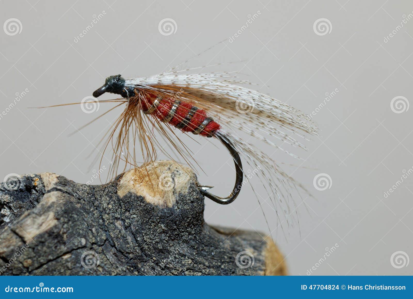 Red fly fishing lure stock photo. Image of artificial - 47704824