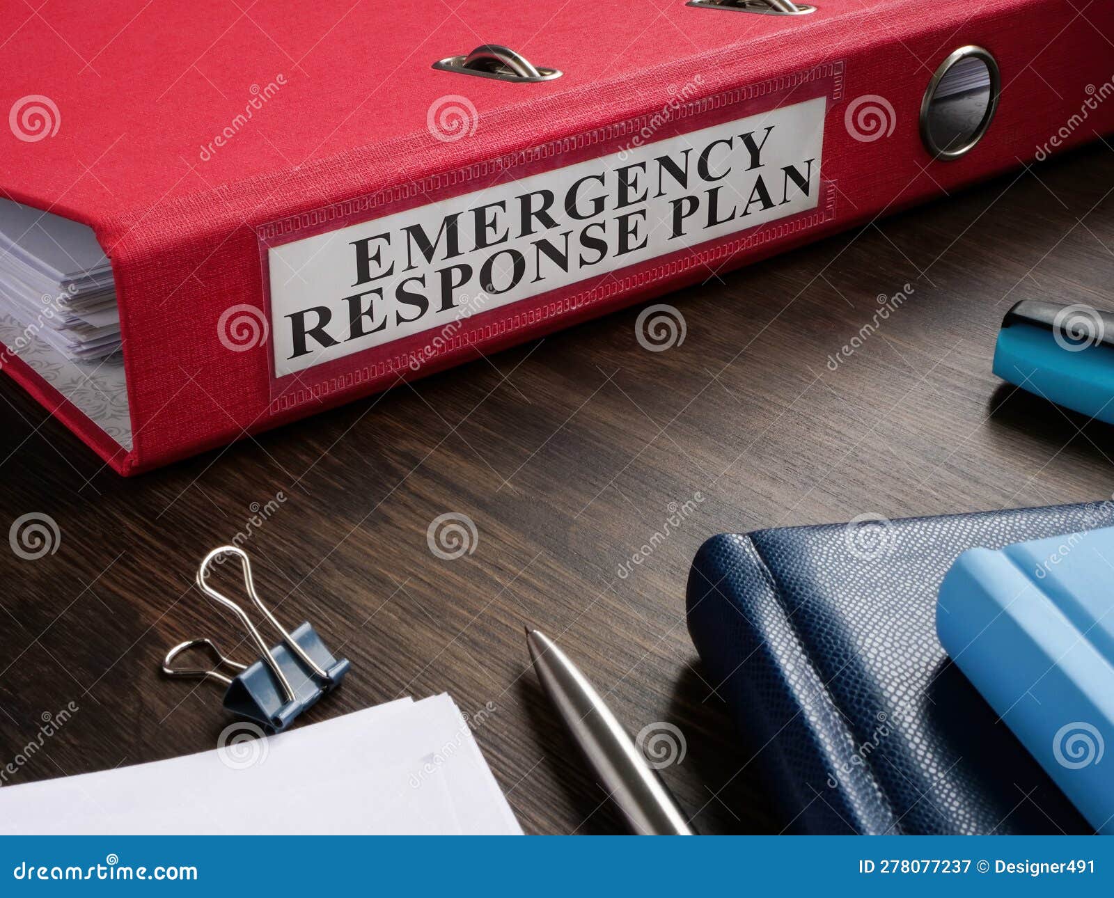 Red Folder with Emergency Response Plan on the Desk. Stock Image ...