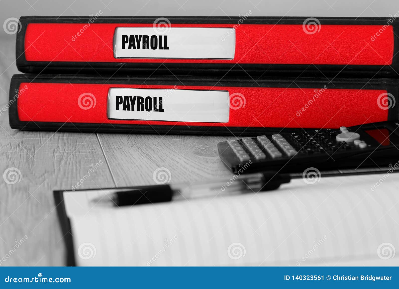Red Folders with Payroll Written on the Label on a Desk Stock Image ...