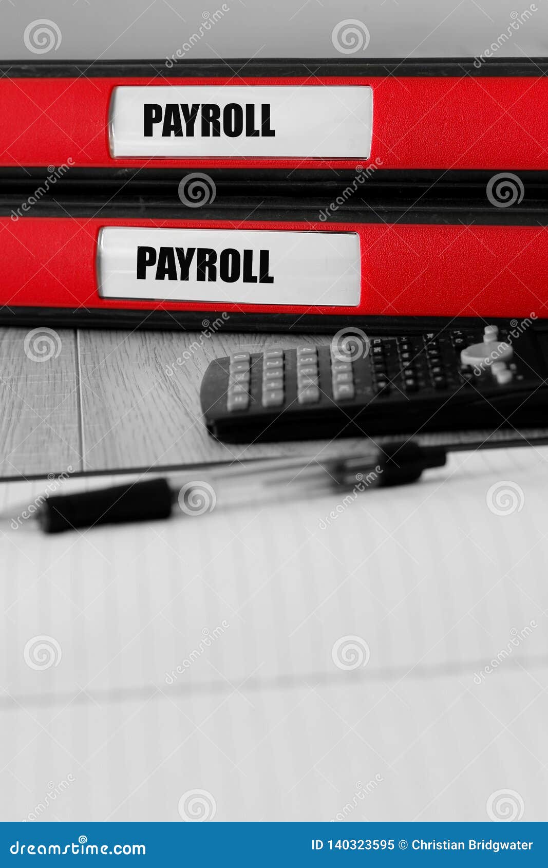 Red Folders with Payroll Written on the Label on a Desk Stock Image ...
