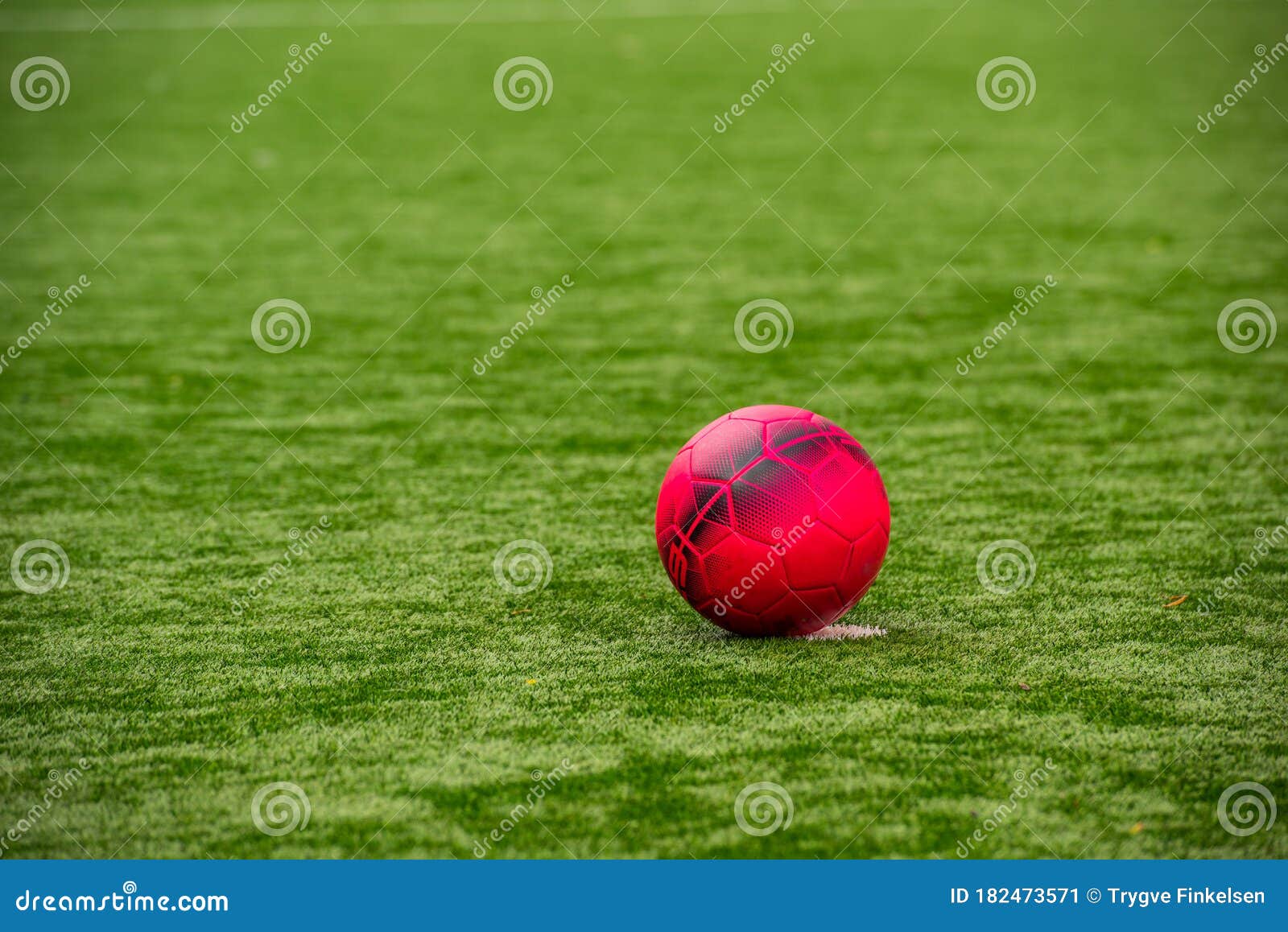 Red Football on a Green Football Field Stock Image - Image of male ...
